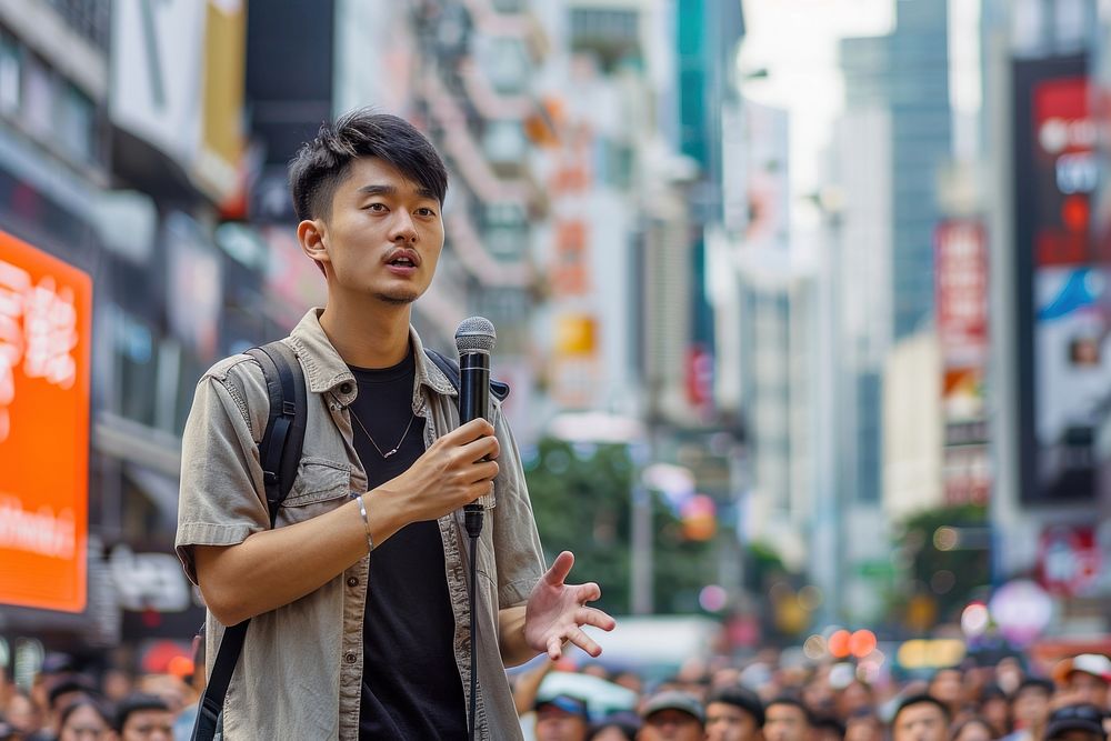 Asian man microphone speaking crowd | Free Photo - rawpixel