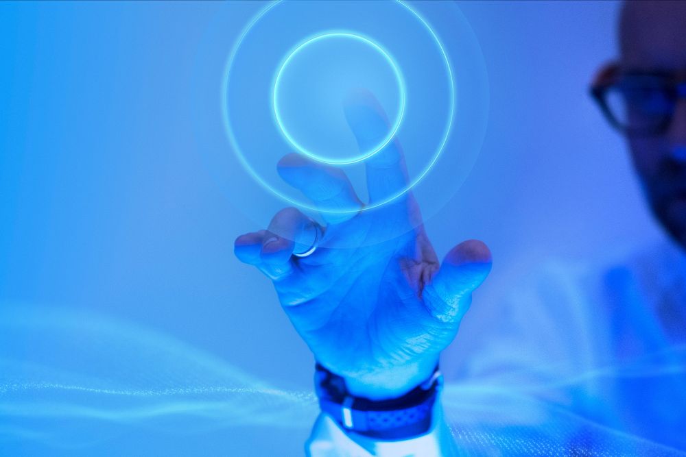 Man touching futuristic blue screen | Free Photo Illustration - rawpixel