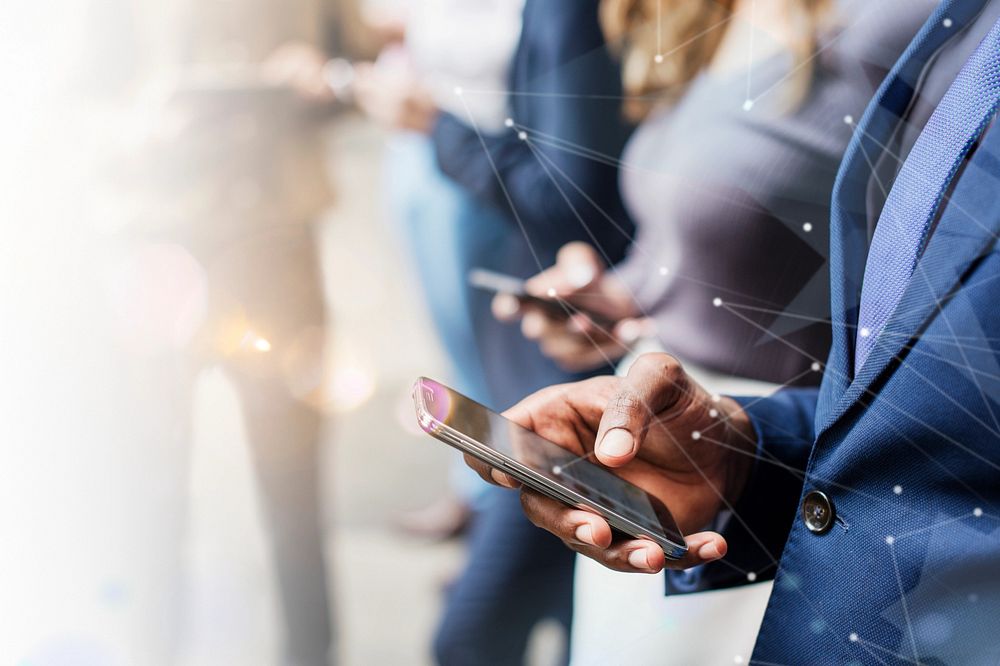 Business people using their phones | Free Photo - rawpixel