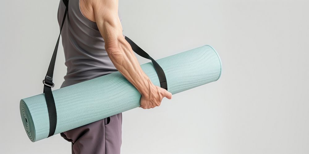 Person carrying yoga mat | Free Photo - rawpixel