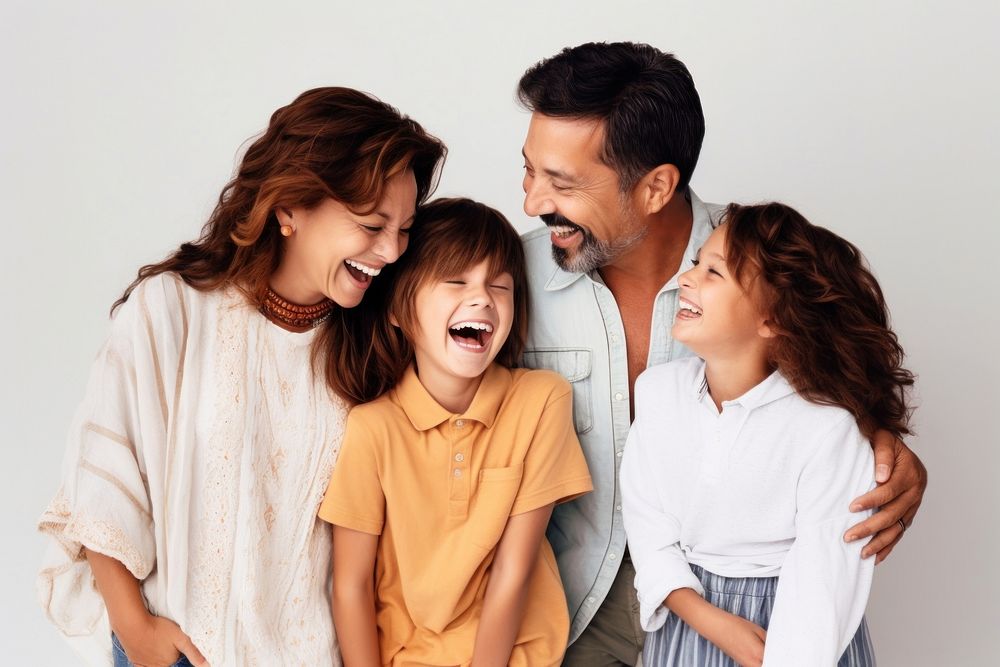 Happy family laughing together | Free Photo - rawpixel