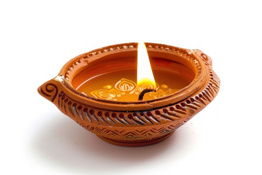 Traditional clay oil lamp lit | Free Photo - rawpixel