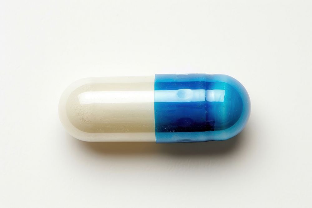 Blue and white capsule pill | Free Photo - rawpixel