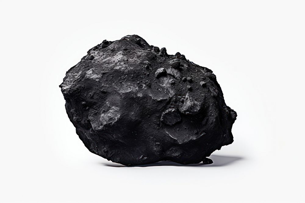 Black meteorite on white background | Free Photo - rawpixel