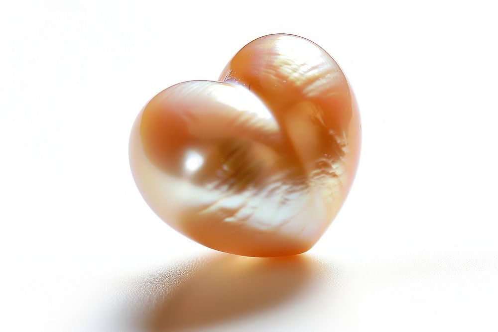 Lustrous heart-shaped pearl beauty | Free Photo - rawpixel