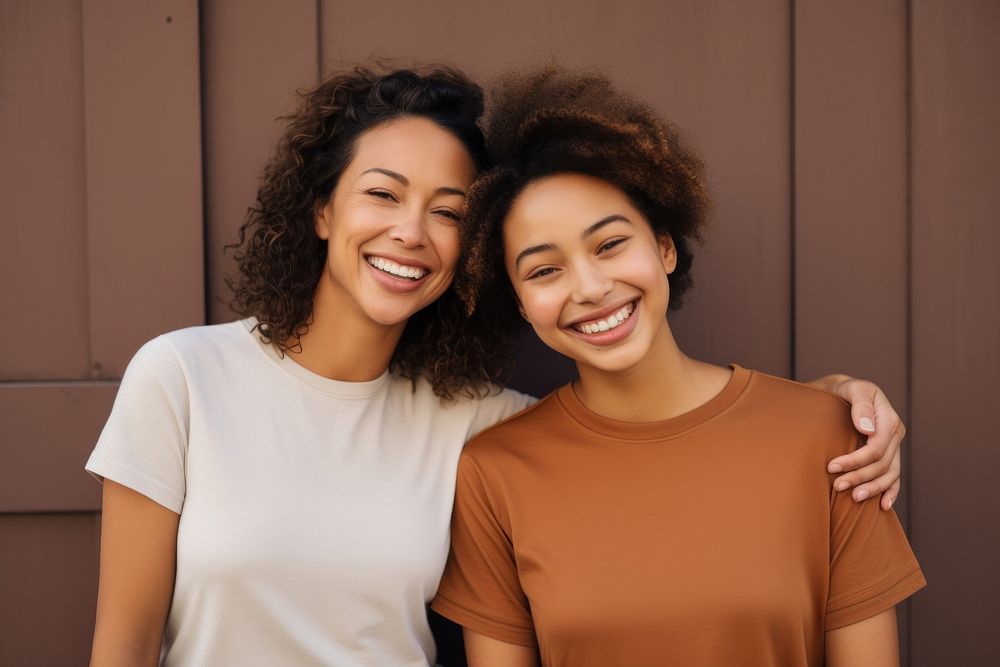 Smiling friends hugging outdoors | Free Photo - rawpixel