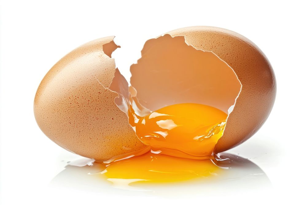 Cracked egg with yolk spilling | Free Photo - rawpixel