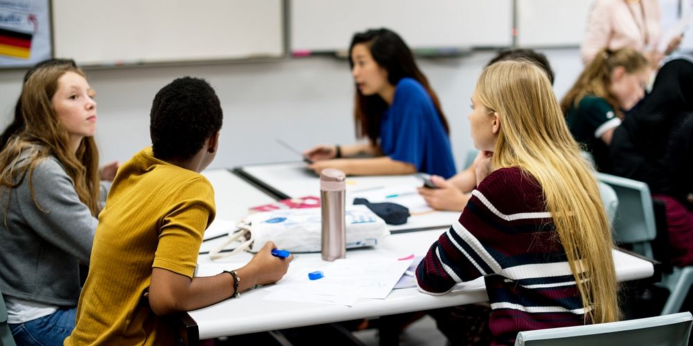 Students collaborating in classroom | Free Photo - rawpixel