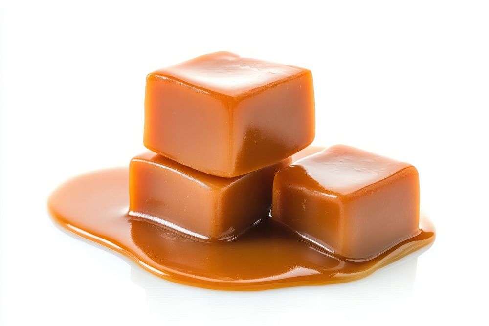Three caramel cubes stacked and | Free Photo - rawpixel