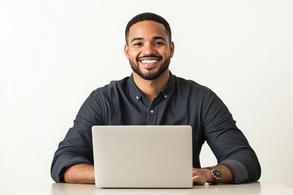 Smiling mixed race man laptop | Free Photo - rawpixel