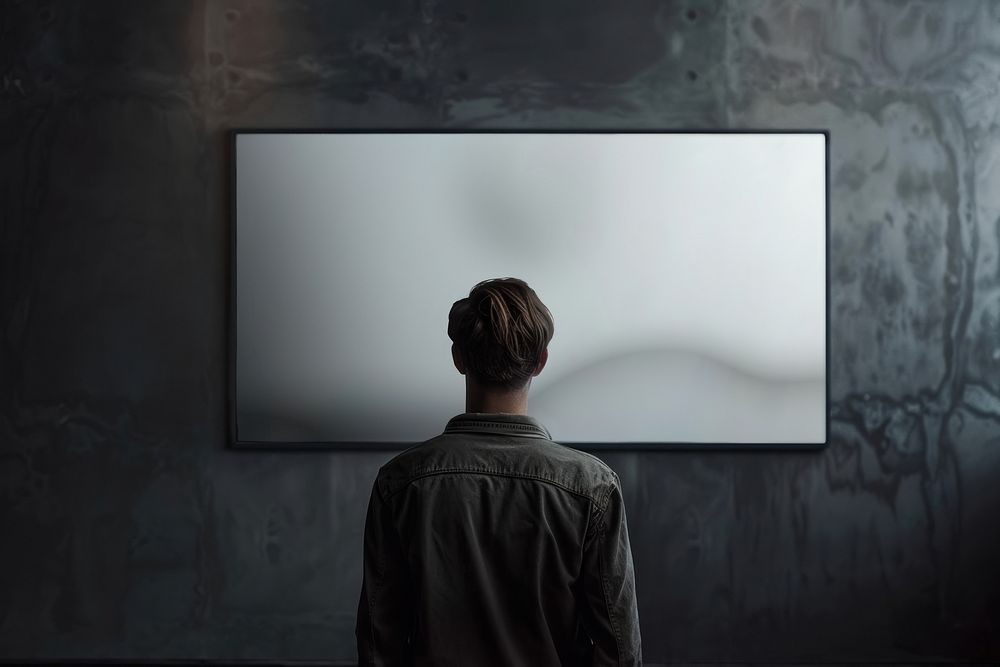Man standing front TV | Free Photo - rawpixel