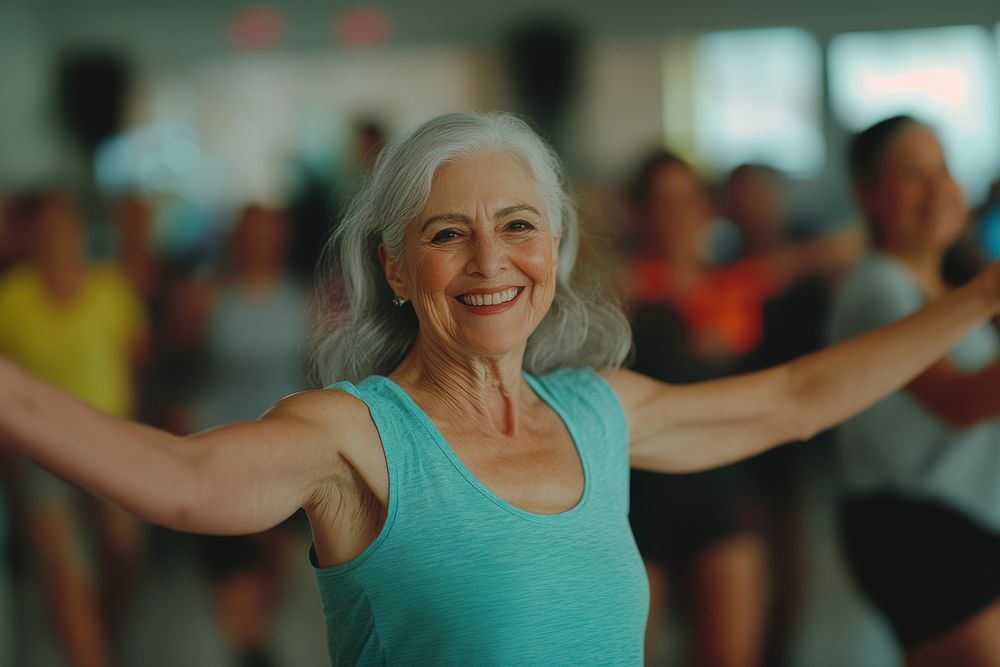 smiling senior woman dancing gym | Free Photo - rawpixel