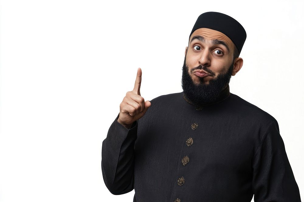 Muslim man pointing index finger | Free Photo - rawpixel