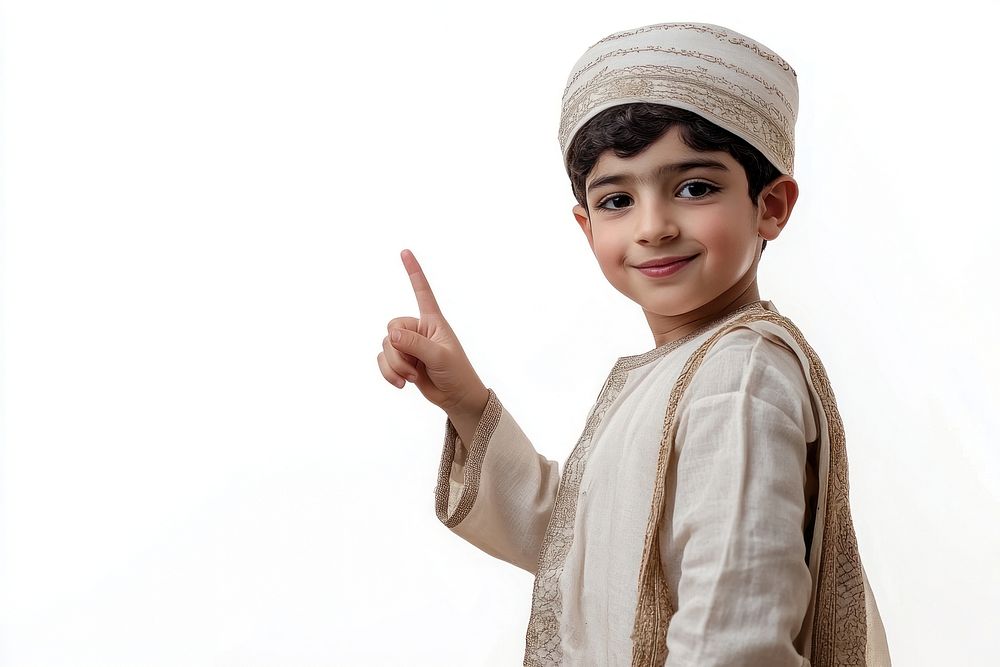 Muslim boy pointing index finger | Free Photo - rawpixel
