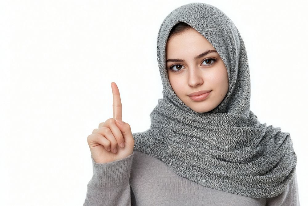 Muslim woman pointing index finger | Free Photo - rawpixel