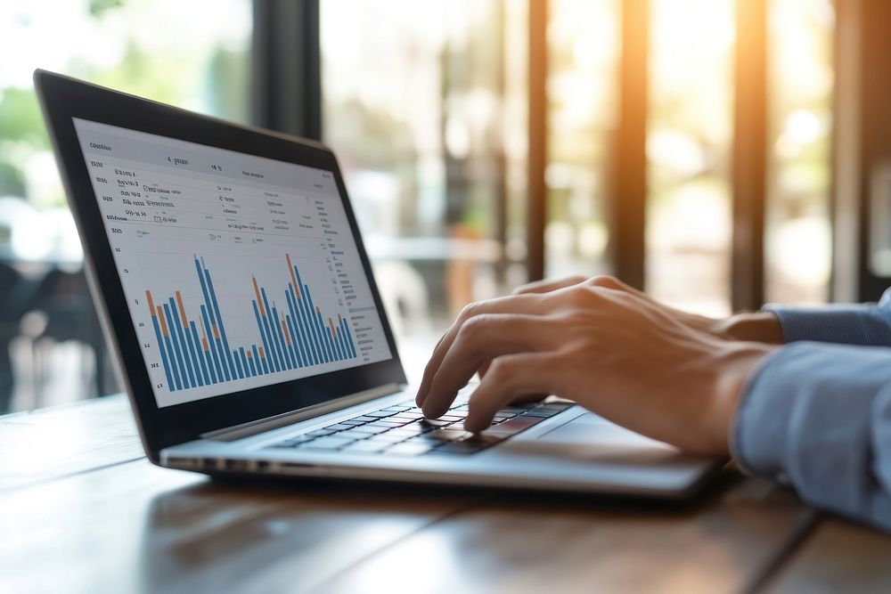 Businessman using laptop chart business | Free Photo - rawpixel