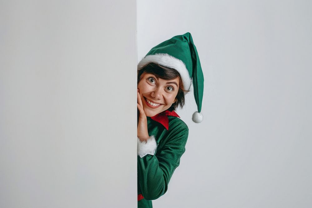 Elf charater peeking background smiling | Free Photo - rawpixel