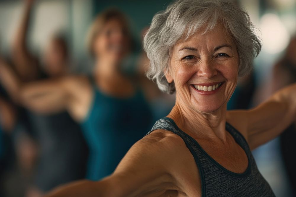 smiling senior woman dancing gym | Free Photo - rawpixel