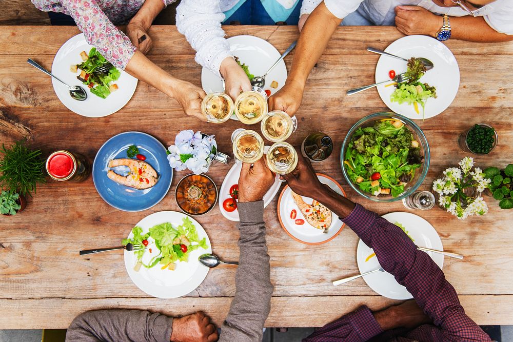 Diverse group friends enjoying meal | Premium Photo - rawpixel