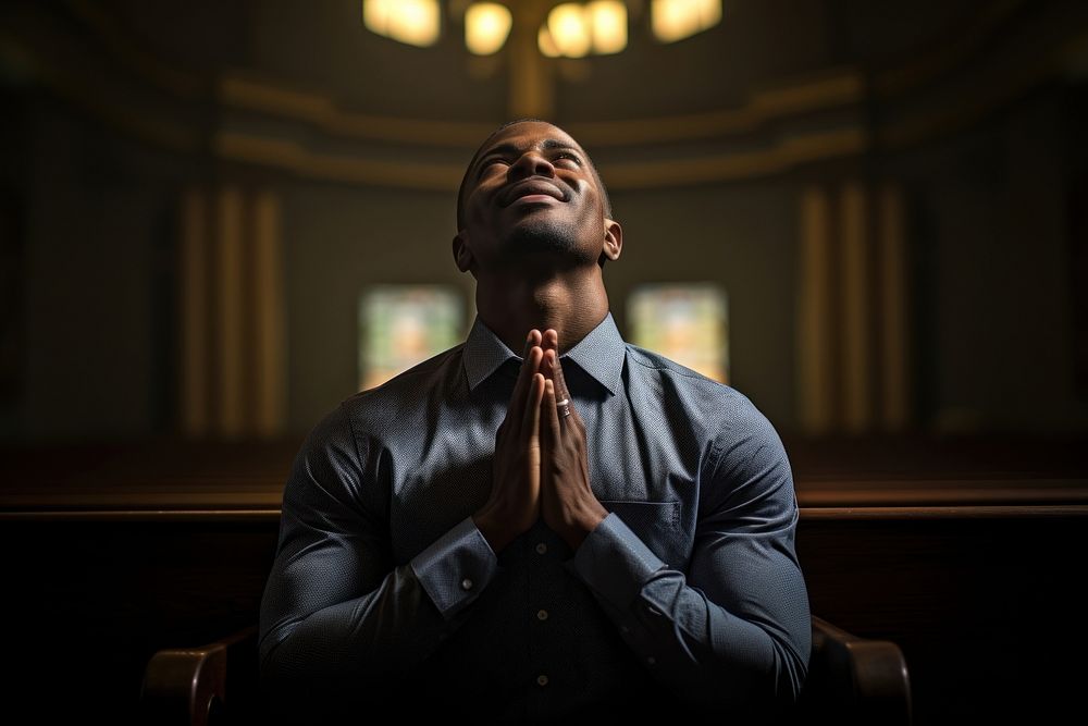 Happy black man praying church | Free Photo - rawpixel