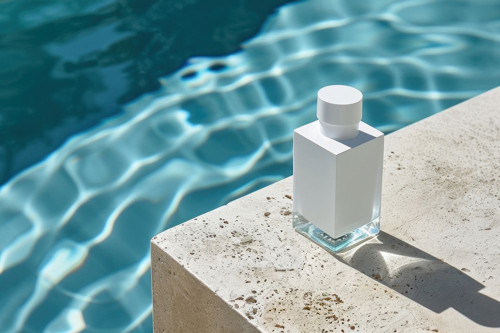 Perfume bottle outdoors perfume pool. | Free Photo - rawpixel