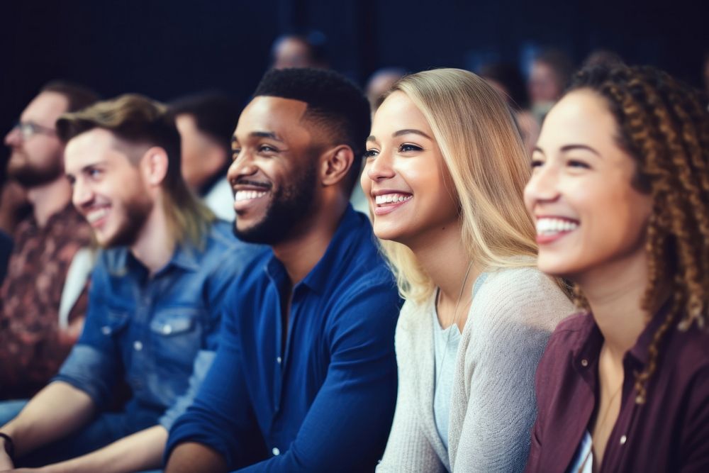 Audience laughing smiling sitting | Free Photo - rawpixel