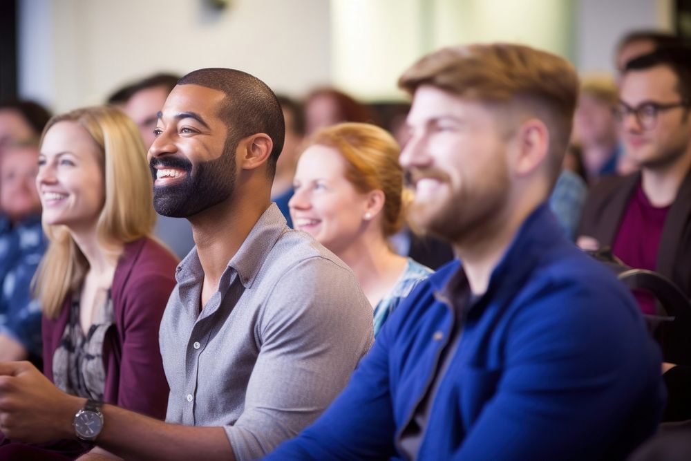 Audience laughing smiling sitting | Free Photo - rawpixel