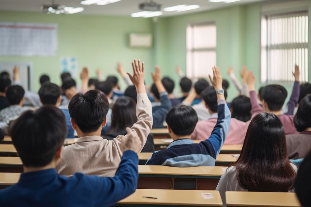 Back view korean student raising | Free Photo - rawpixel