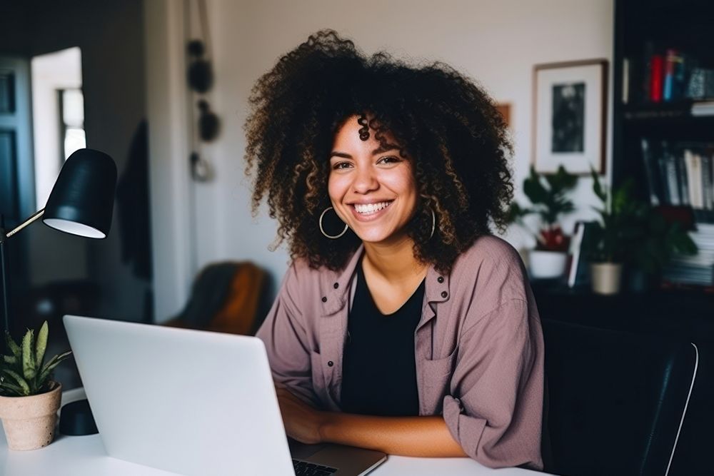 woman working front computer smiling | Free Photo - rawpixel