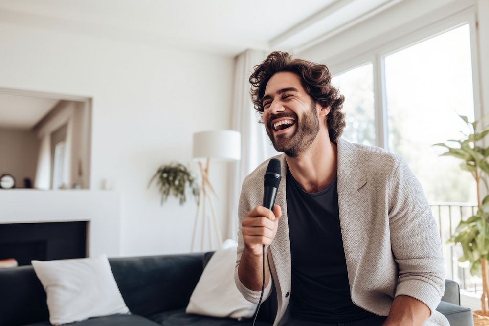 man holding microphone singing laughing | Premium Photo - rawpixel