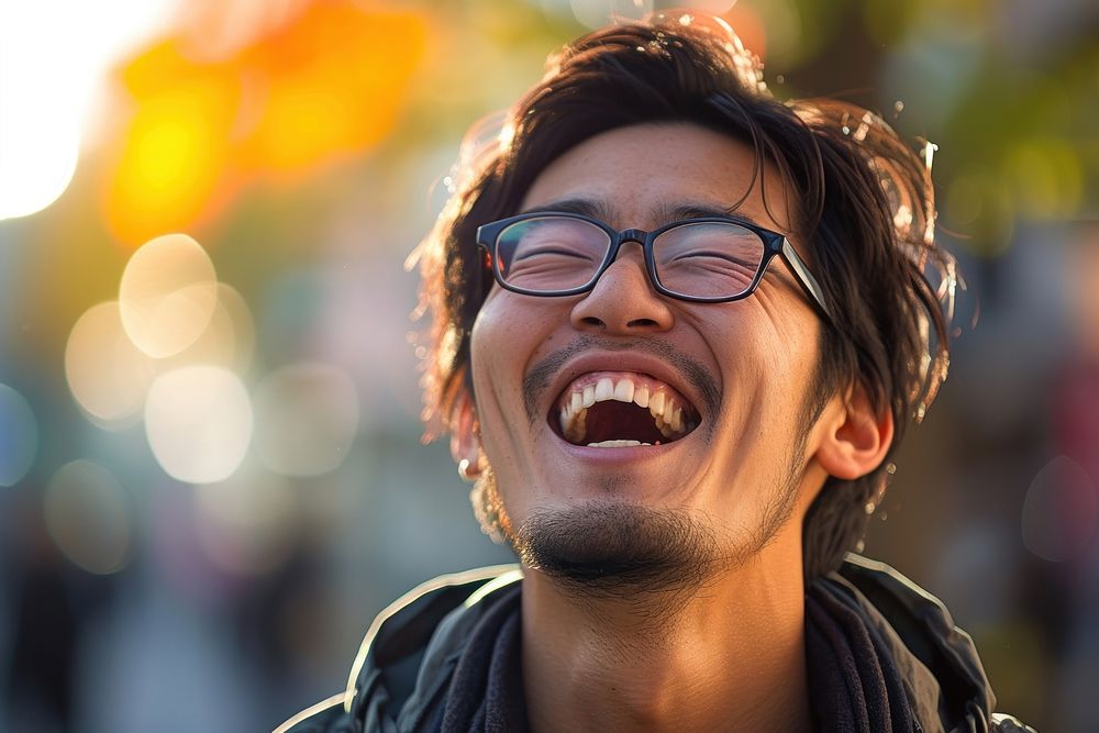 Japanese man laughing glasses smile. | Free Photo - rawpixel