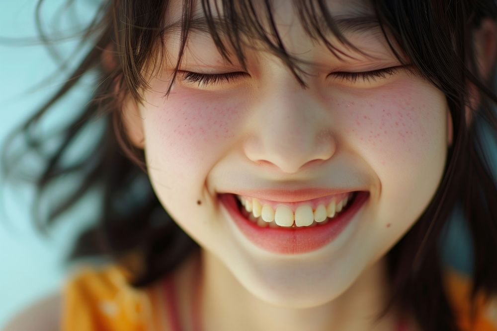 Young japanese girl laughing teeth | Free Photo - rawpixel