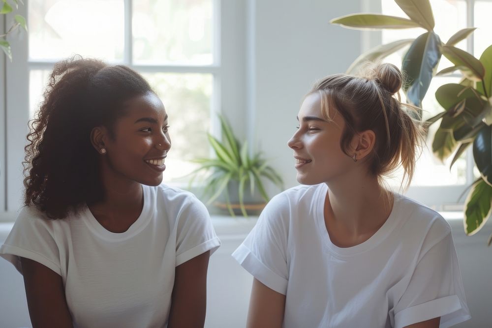 2 women different races talking | Free Photo - rawpixel