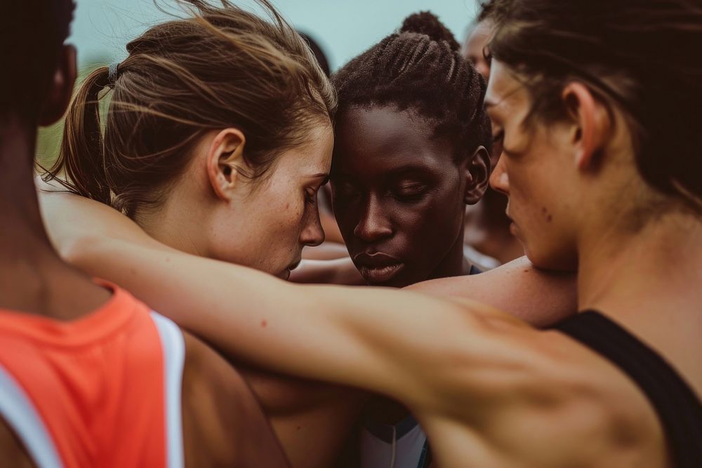 Team unity embracing athlete sports. | Free Photo - rawpixel
