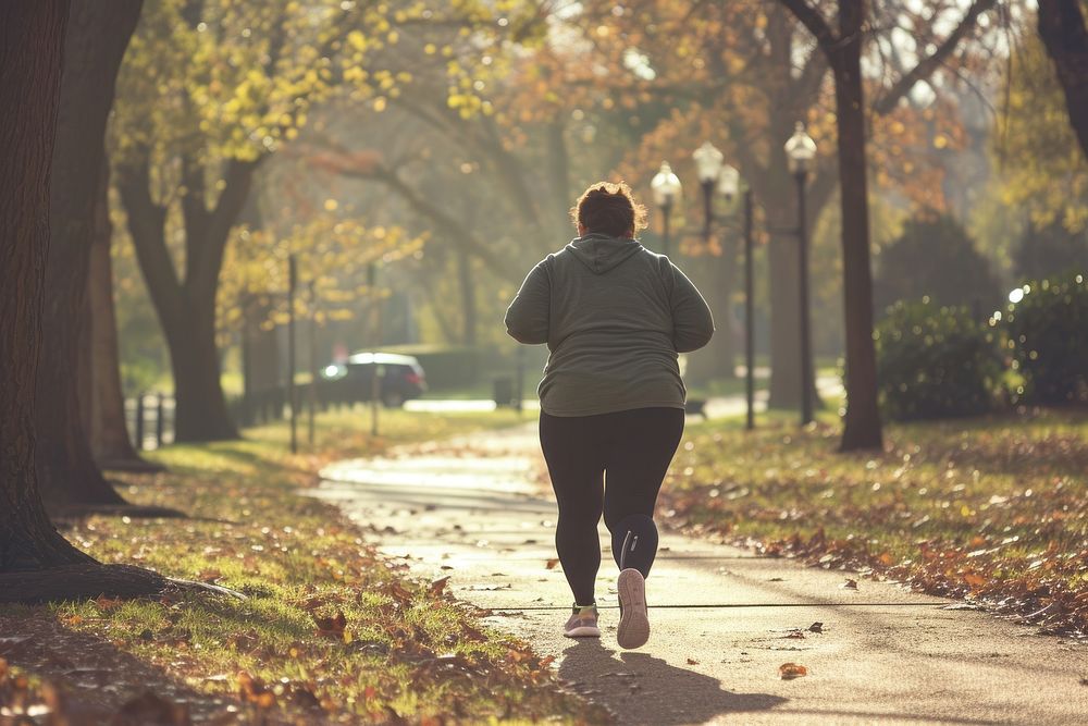 Fat woman jogging running autumn | Free Photo - rawpixel