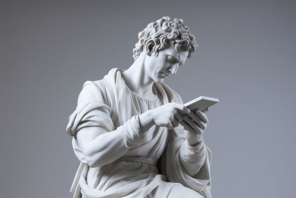 sculpture man holding smart phone | Free Photo - rawpixel