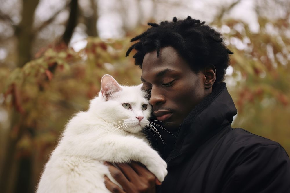 Man holding their cat portrait | Premium Photo - rawpixel