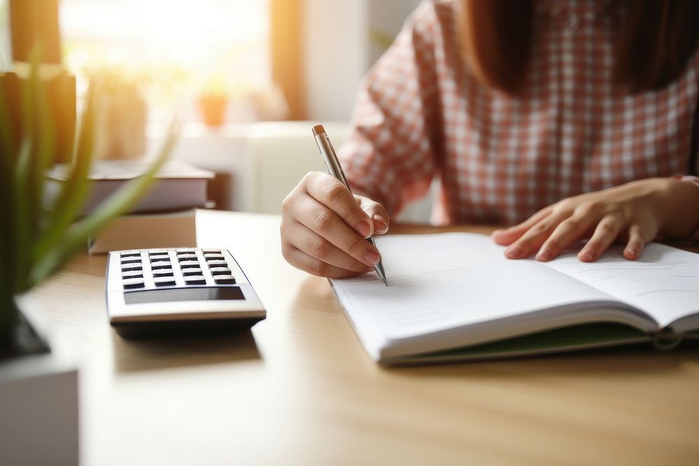 Hand doing home accounting writing | Premium Photo - rawpixel