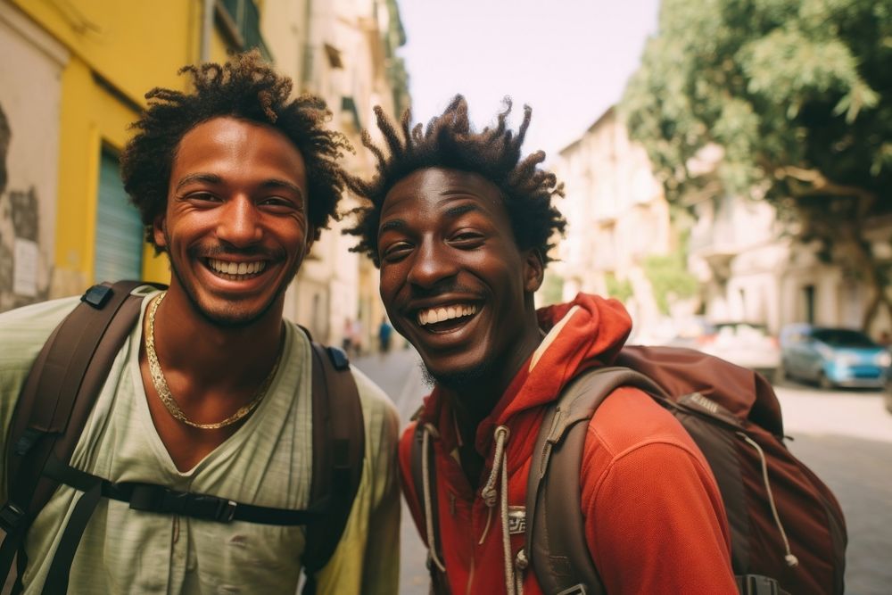 African Backpackers italy laughing outdoors | Premium Photo - rawpixel