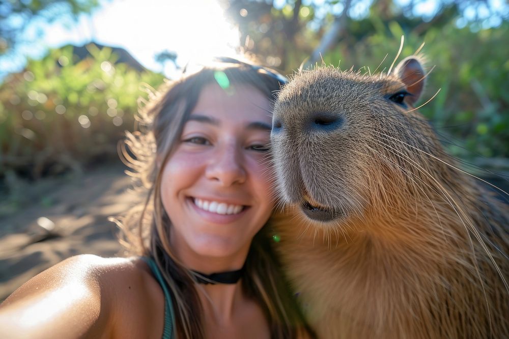 Capybara young woman animal portrait | Free Photo - rawpixel