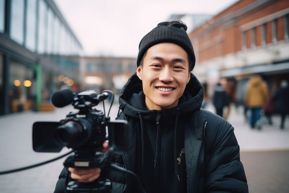 Influencer filming camera smile. | Free Photo - rawpixel
