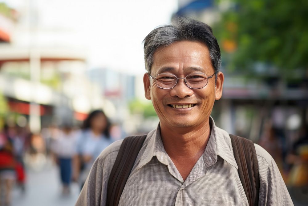 Thai person portrait smile glasses. | Premium Photo - rawpixel