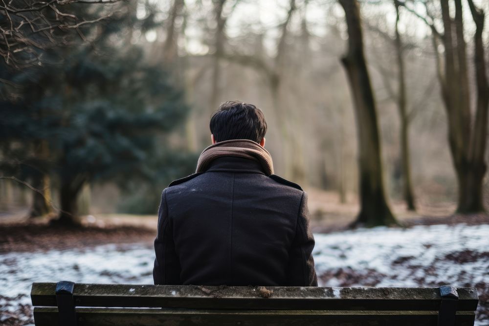 Anxiety sitting bench adult. AI | Free Photo - rawpixel