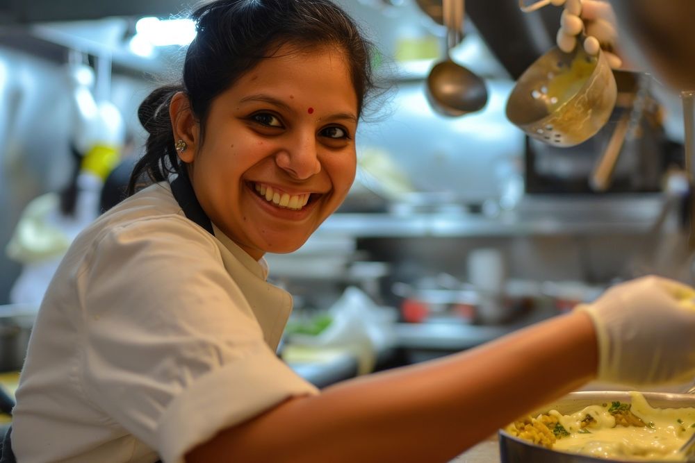Indian female chef smiling cooking | Premium Photo - rawpixel