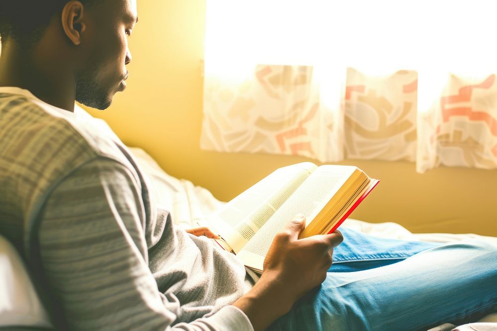 African American young man reading | Free Photo - rawpixel