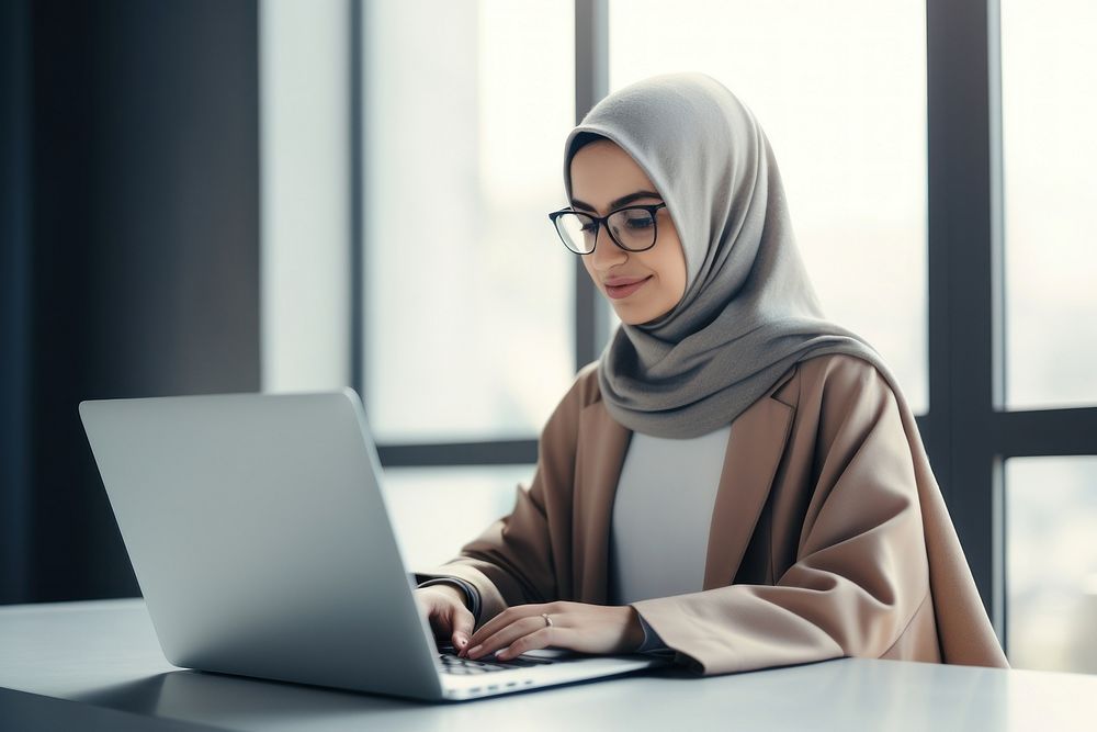 Muslim woman laptop computer glasses. | Free Photo - rawpixel