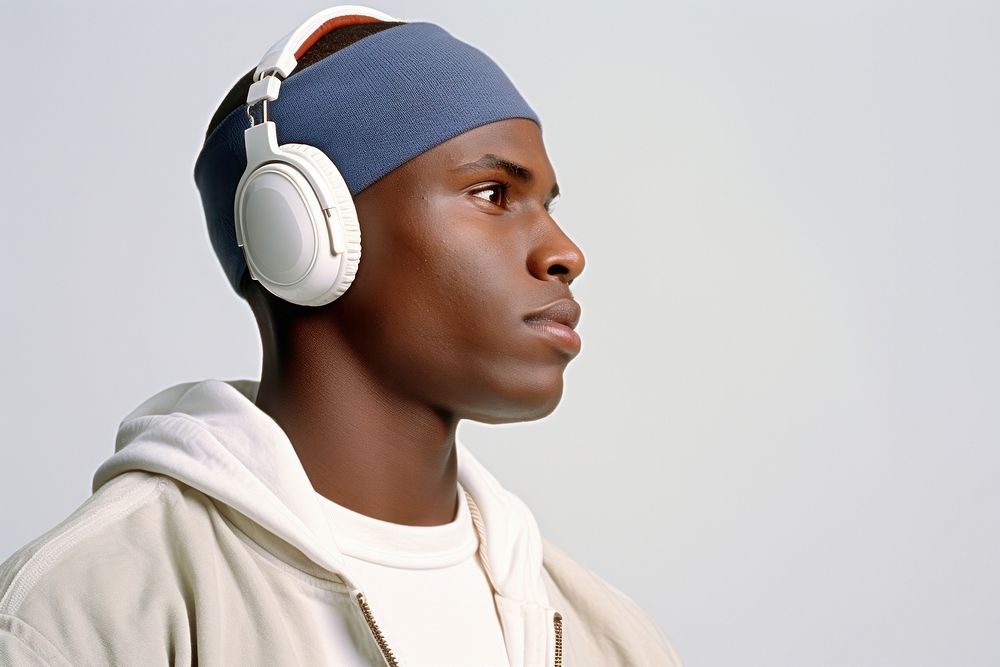 African-American man wearing headphone listening | Free Photo - rawpixel