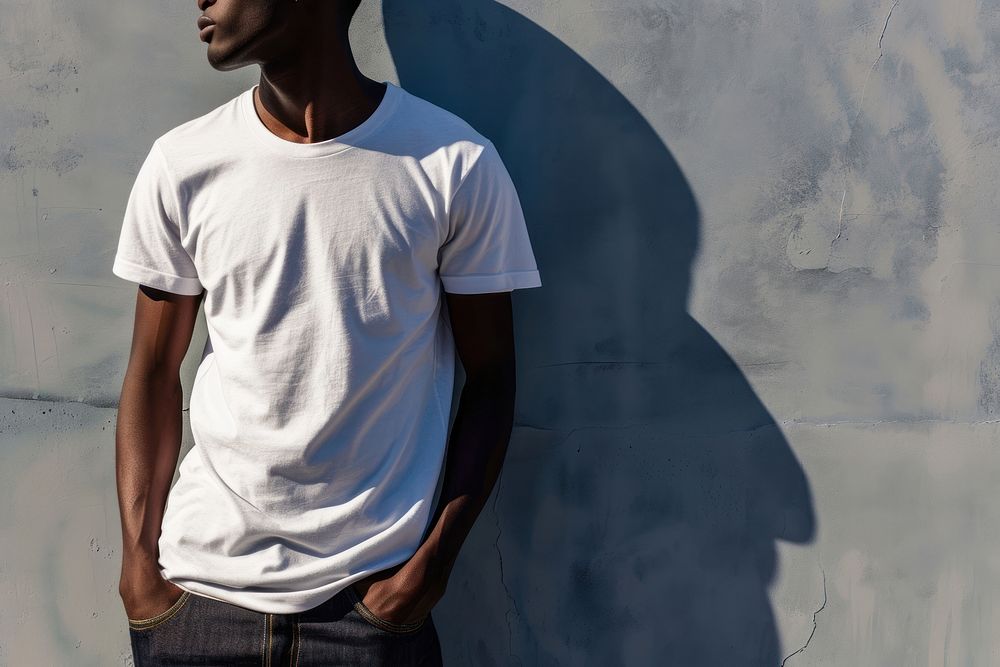 Black man wearing t-shirt standing | Free Photo - rawpixel