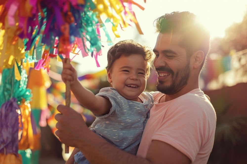 Hispanic dad portrait holding family. | Premium Photo - rawpixel