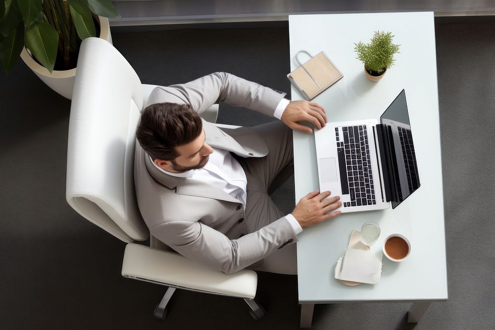 Office worker using computer furniture | Premium Photo - rawpixel